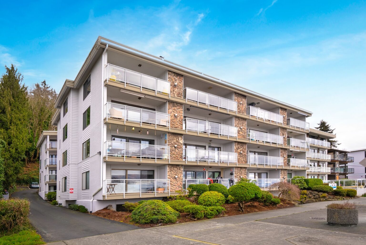 Light-Filled Alki Beach Condo with Stunning Puget Sound Views | Lamb & Co.